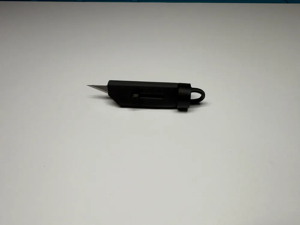 Retractable Box cutter keychaing - fast print by Sandholm85 MakerWorld ...