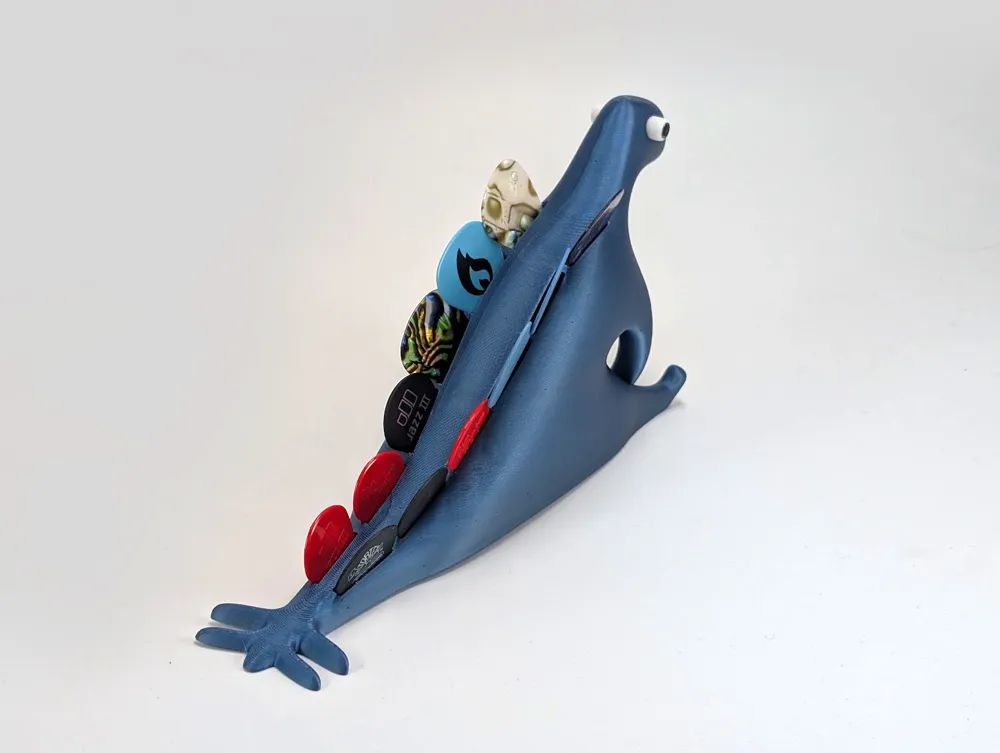 Pickosaurus for large Fender-style picks by Contributing Factor MakerWorld: Download Free 3D Models