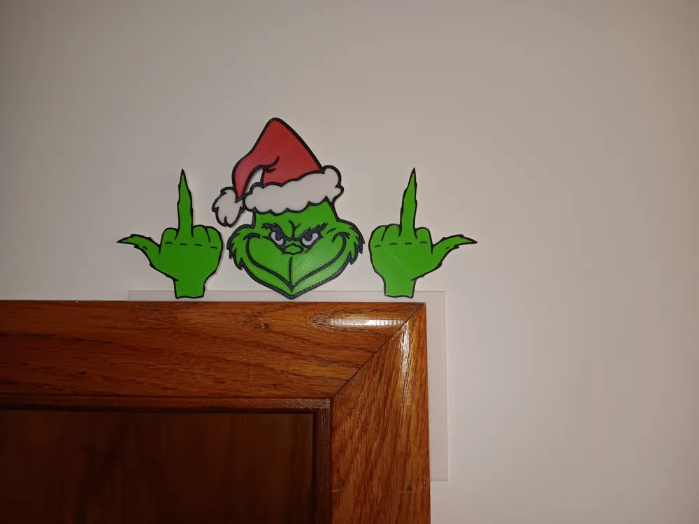 El Grinch mostrando el dedo medio en la esquina de la puerta - Modelo ...