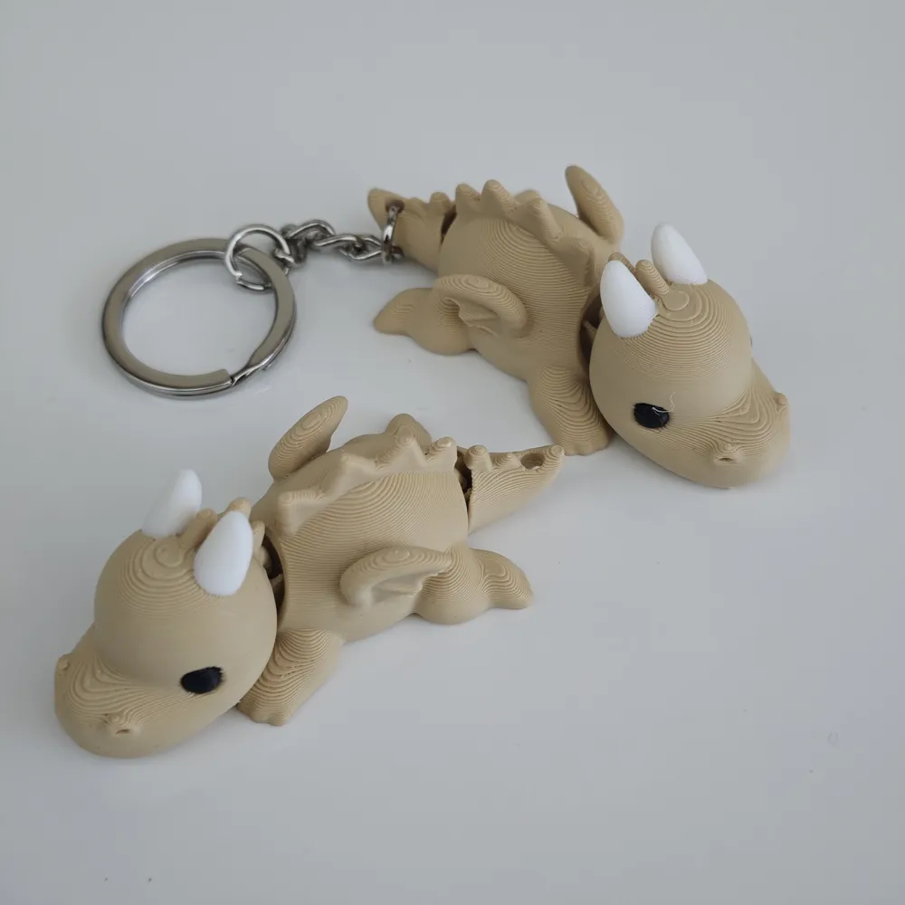 Cute Dragon Mini Flexi Keychain - Free 3D Print Model - MakerWorld