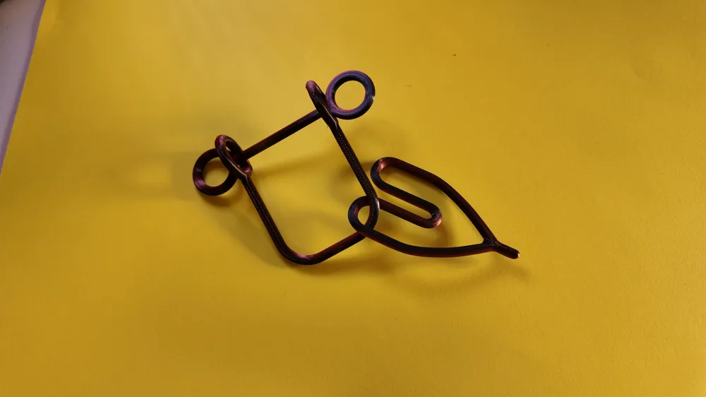 Wire Puzzle – "Loop & Heart" - Free 3D Print Model - MakerWorld