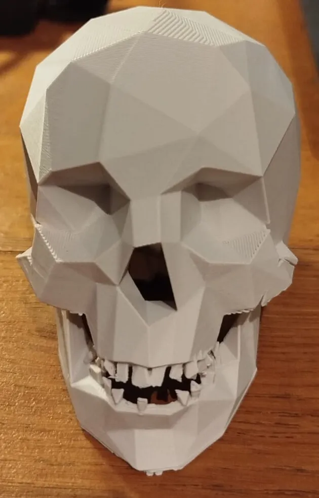 Low Poly skull with missing teeth - Free 3D Print Model - MakerWorld