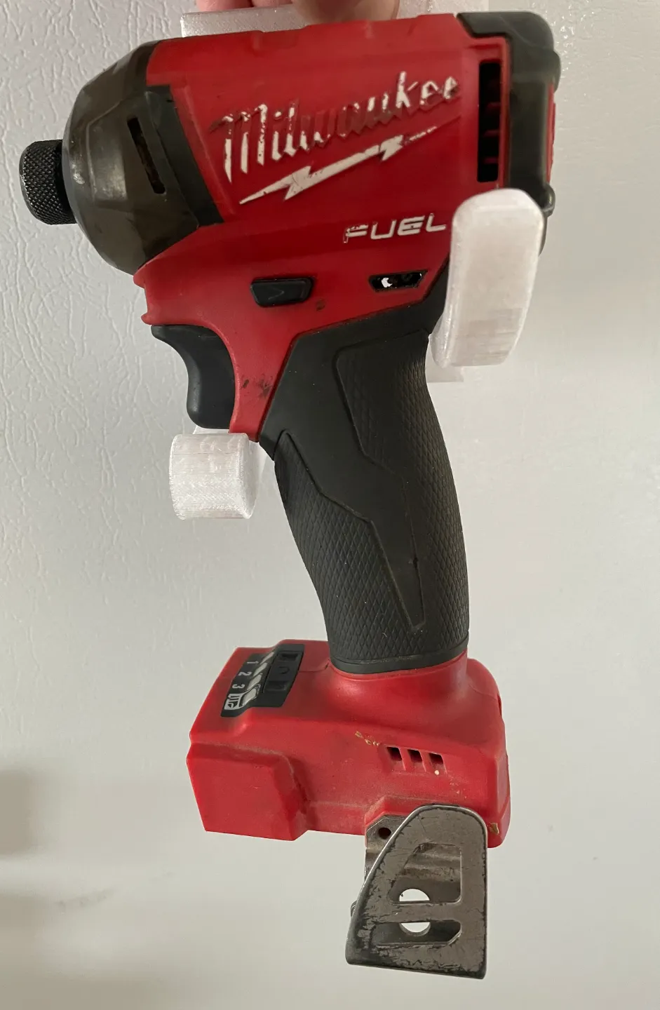 Milwaukee impact wall mounted holder by Cosmok - MakerWorld