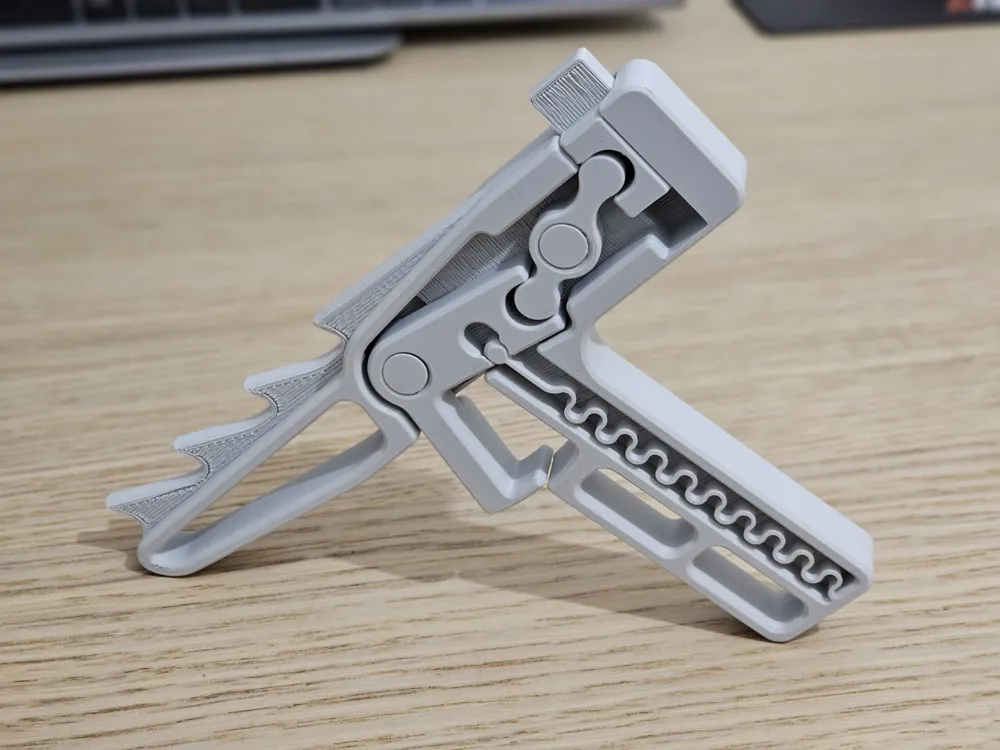 Hair ties gun (print in place) by Michal MakerWorld: Download Free 3D ...