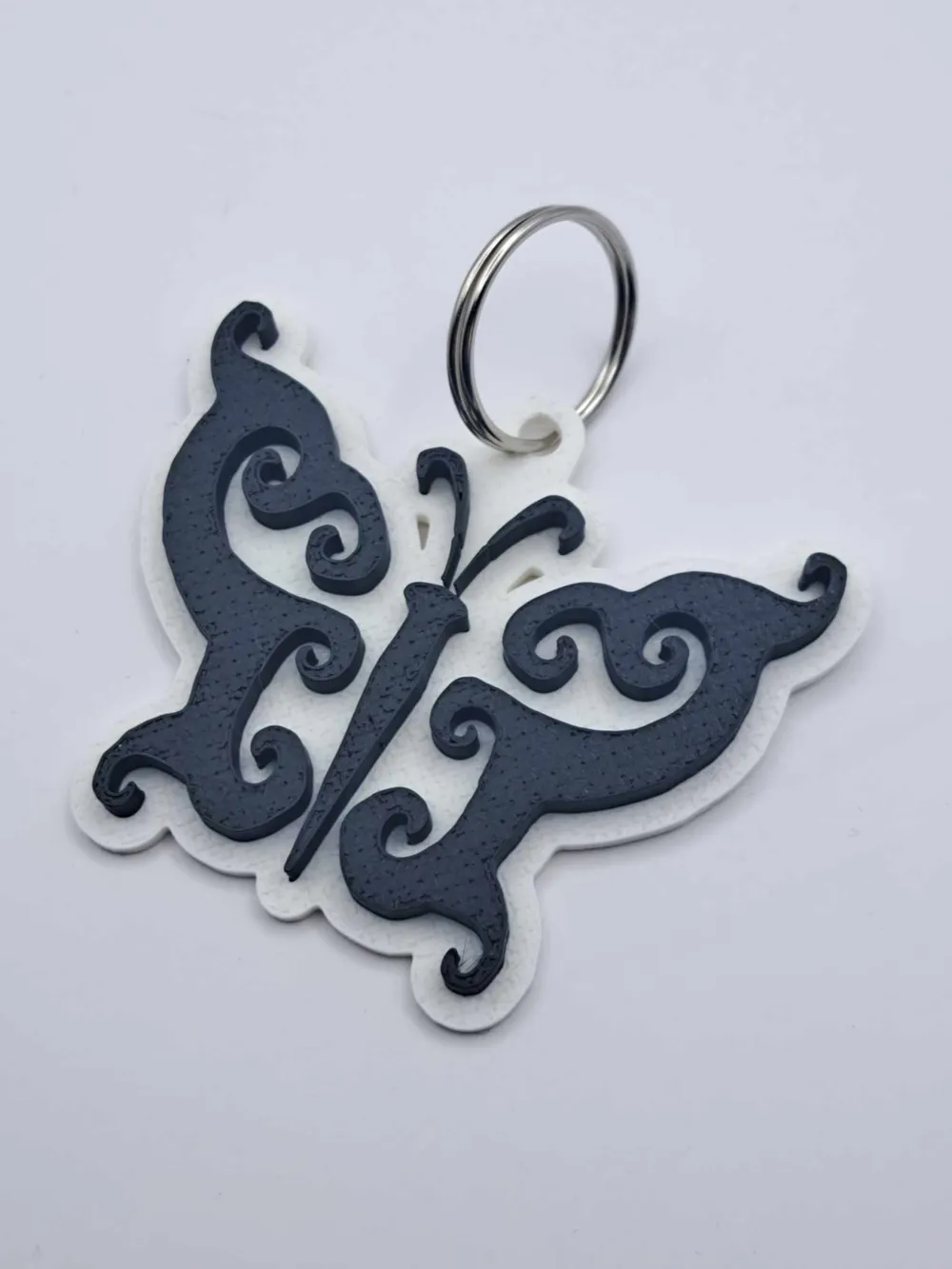 Tribal Butterfly Keychain by W00ster - MakerWorld