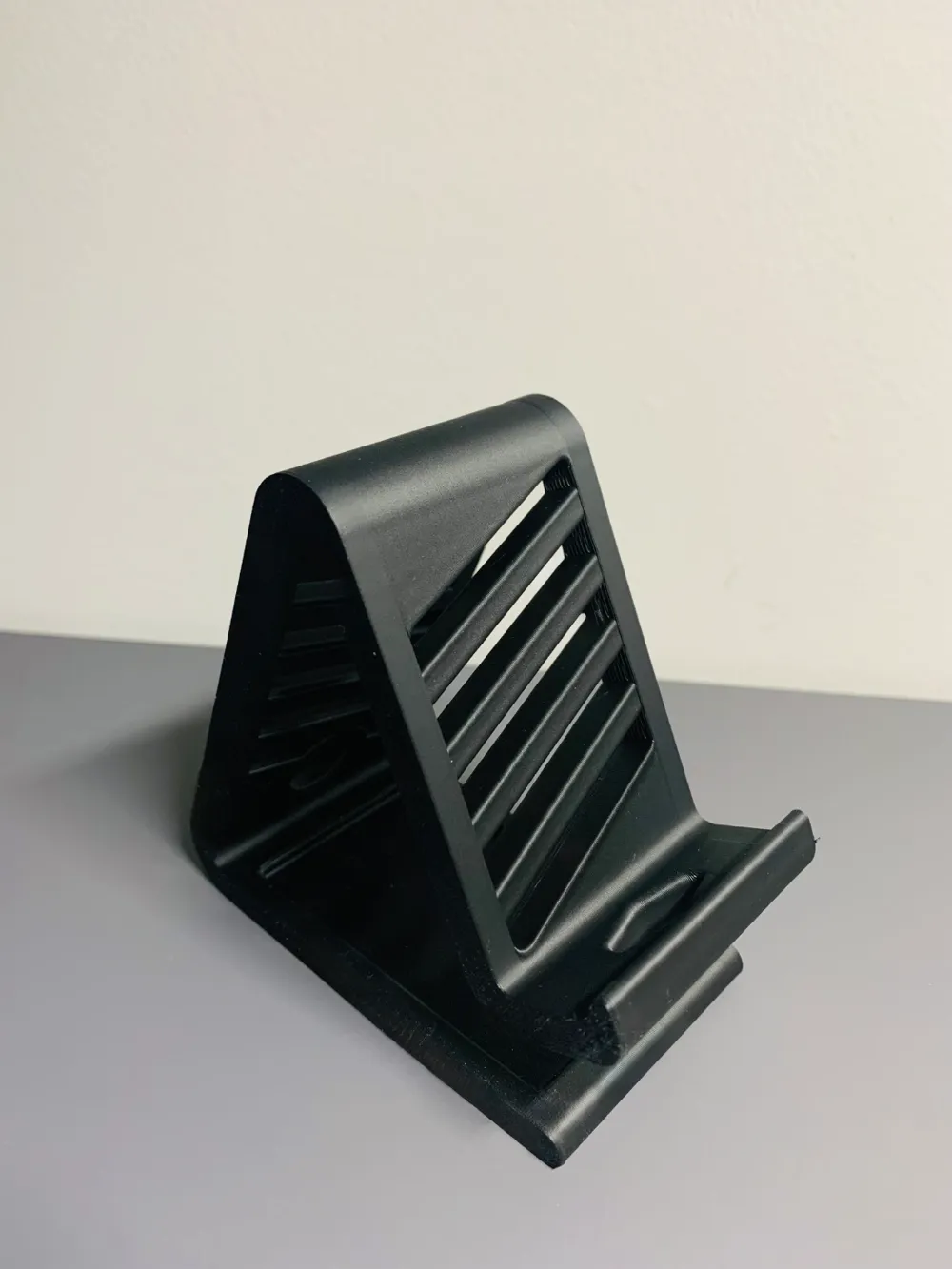 Phone Stand - Sleek & Modern - Free 3D Print Model - MakerWorld