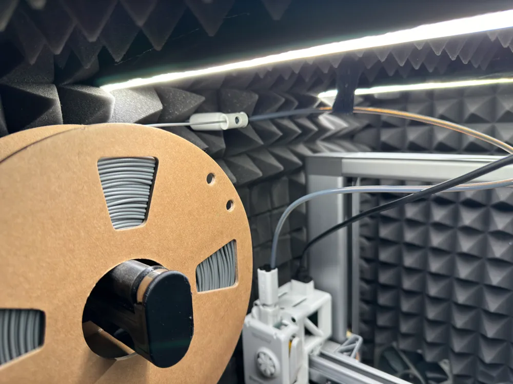 Bambu Lab A1 filament guide wall mount by philipkaehm - MakerWorld