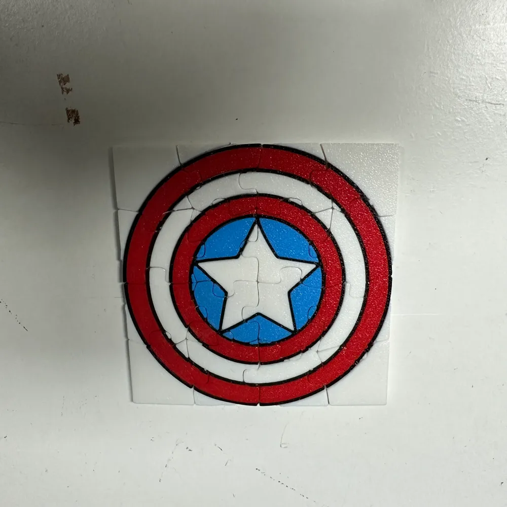16 pieces puzzle: Captain America Shield by TheHarmory - MakerWorld