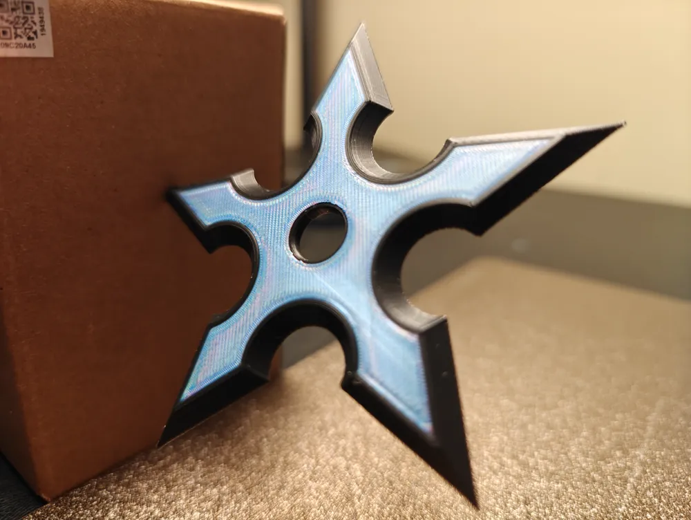 Multi-Colored Ninja Throwing Star - Free 3D Print Model - MakerWorld